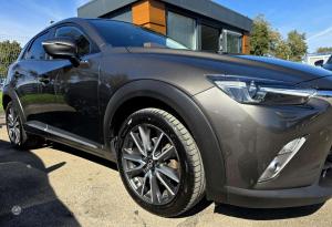 Brown Mazda CX-3 2017 in Marijampole, with an engine capacity of 2.00 L and mileage of 169 thousand km for 14250 €, photo 6 on AUTOMOTO.COM.LV
