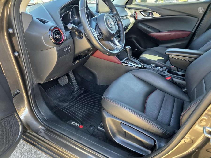 Brown Mazda CX-3 2017 in Marijampole, with an engine capacity of 2.00 L and mileage of 169 thousand km for 14250 €, photo 9 on AUTOMOTO.COM.LV