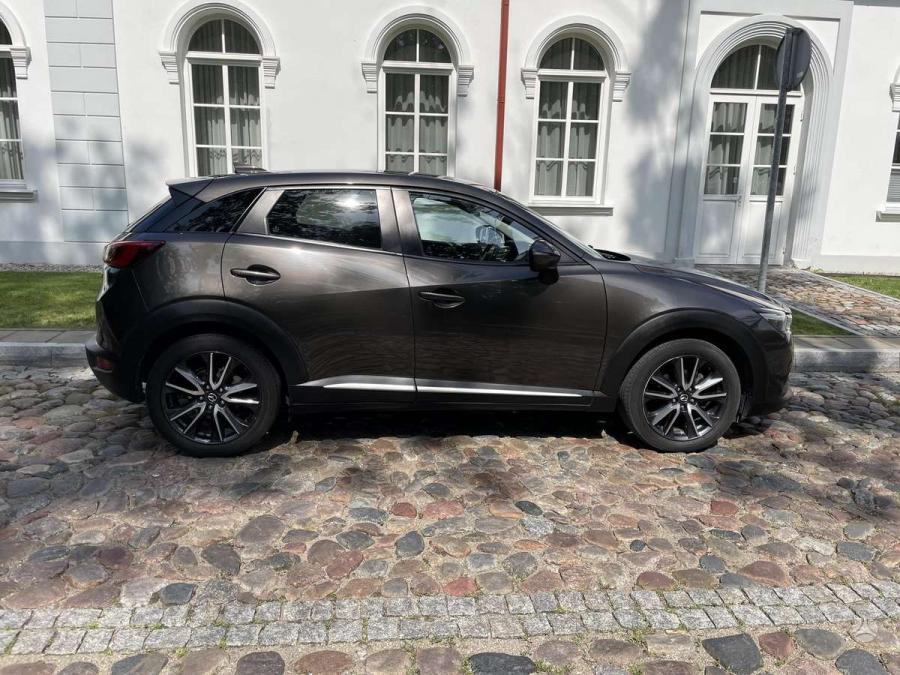 Brown Mazda CX-3 2018 in Kaunas, with an engine capacity of 2.00 L and mileage of 125 thousand km for 12800 €, photo 6 on AUTOMOTO.COM.LV