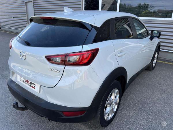 Grey Mazda CX-3 2015 in Vilnius, with an engine capacity of 1.50 L and mileage of 210 thousand km for 6900 €, photo 5 on AUTOMOTO.COM.LV