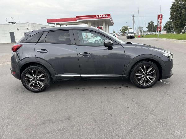 Grey Mazda CX-3 2016 in Taurage, with an engine capacity of 1.50 L and mileage of 228 thousand km for 6900 €, photo 6 on AUTOMOTO.COM.LV