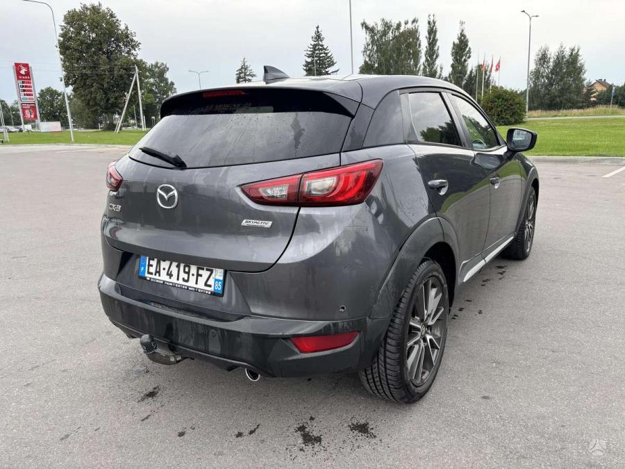 Grey Mazda CX-3 2016 in Taurage, with an engine capacity of 1.50 L and mileage of 228 thousand km for 6900 €, photo 8 on AUTOMOTO.COM.LV