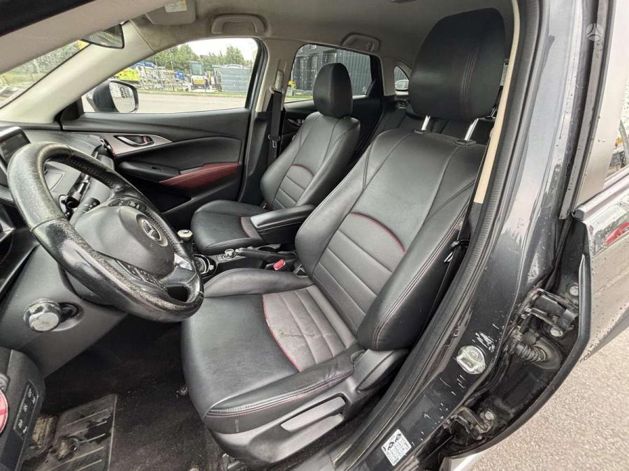 Grey Mazda CX-3 2016 in Taurage, with an engine capacity of 1.50 L and mileage of 228 thousand km for 6900 €, photo 12 on AUTOMOTO.COM.LV