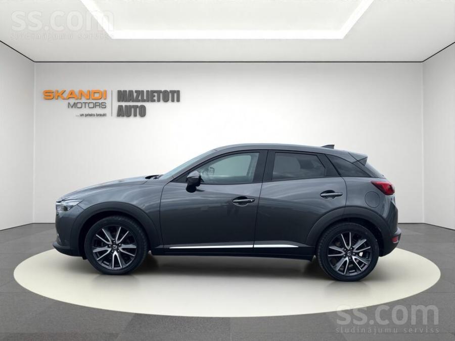 Grey Mazda CX-3 2017 in Riga, with an engine capacity of 2.00 L and mileage of 122 thousand km for 11990 €, photo 4 on AUTOMOTO.COM.LV