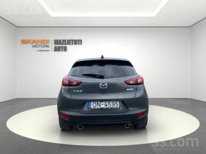Grey Mazda CX-3 2017 in Riga, with an engine capacity of 2.00 L and mileage of 122 thousand km for 11990 €, photo 6 on AUTOMOTO.COM.LV