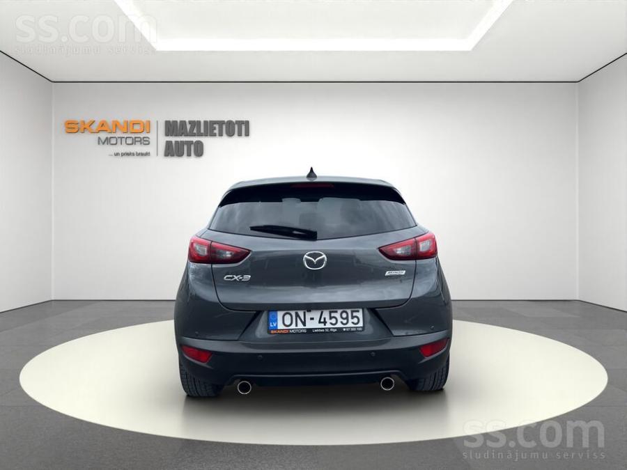 Grey Mazda CX-3 2017 in Riga, with an engine capacity of 2.00 L and mileage of 122 thousand km for 11990 €, photo 6 on AUTOMOTO.COM.LV