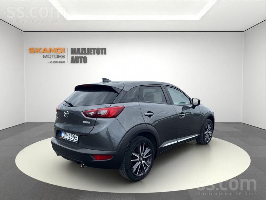 Grey Mazda CX-3 2017 in Riga, with an engine capacity of 2.00 L and mileage of 122 thousand km for 11990 €, photo 7 on AUTOMOTO.COM.LV