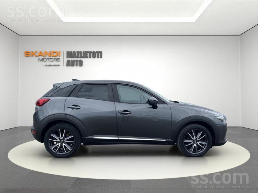 Grey Mazda CX-3 2017 in Riga, with an engine capacity of 2.00 L and mileage of 122 thousand km for 11990 €, photo 8 on AUTOMOTO.COM.LV