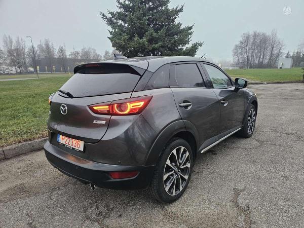 Grey Mazda CX-3 2019 in Kaunas, with an engine capacity of 1.76 L and mileage of 210 thousand km for 11950 €, photo 5 on AUTOMOTO.COM.LV