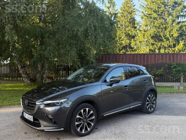 Grey Mazda CX-3 2019 in Riga, with an engine capacity of 2.00 L and mileage of 90 thousand km for 17500 €, photo 1 on AUTOMOTO.COM.LV