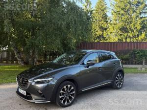 Grey Mazda CX-3 2019 in Riga, with an engine capacity of 2.00 L and mileage of 90 thousand km for 17500 €, photo  on AUTOMOTO.COM.LV