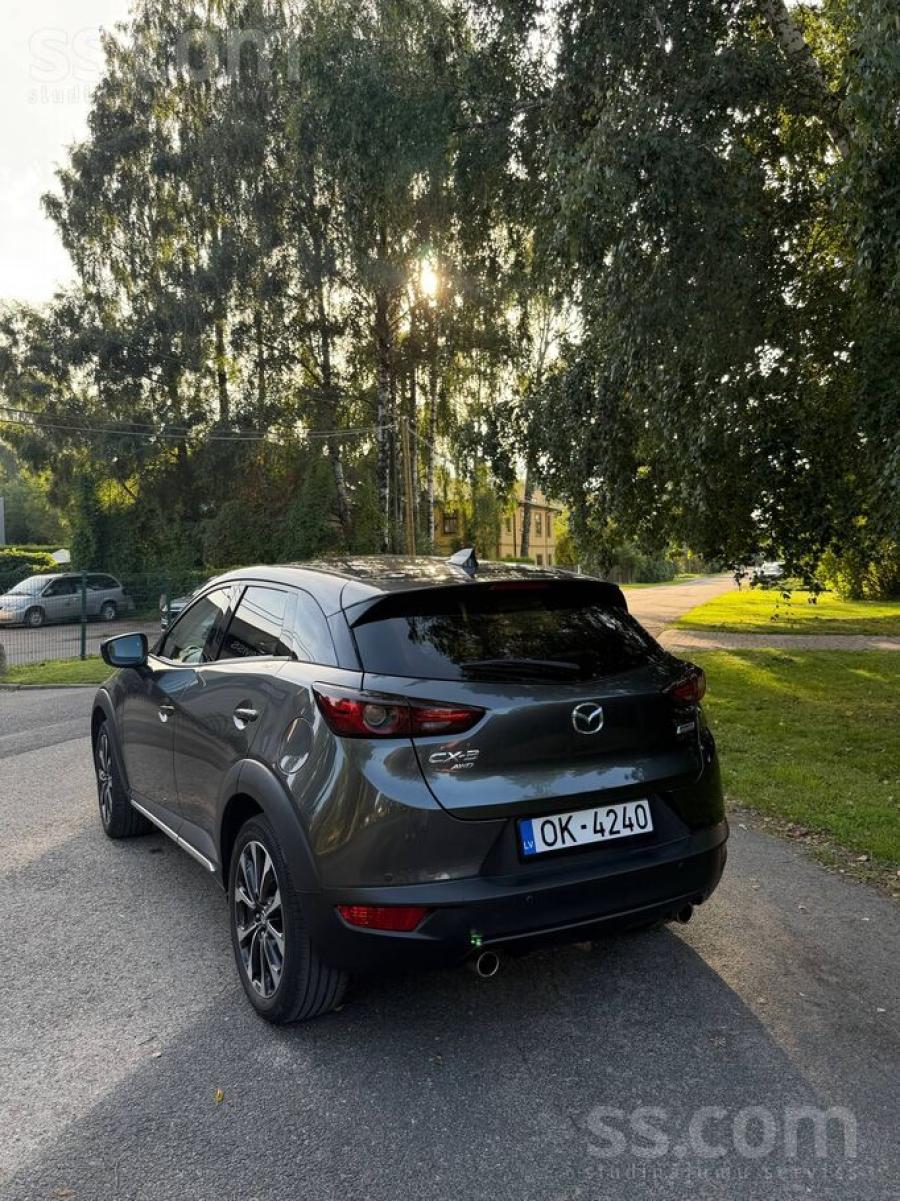 Grey Mazda CX-3 2019 in Riga, with an engine capacity of 2.00 L and mileage of 90 thousand km for 17500 €, photo 3 on AUTOMOTO.COM.LV
