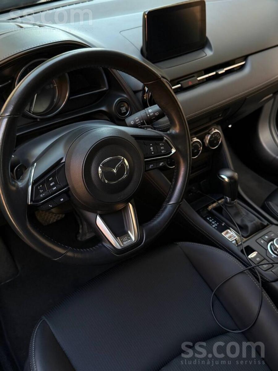Grey Mazda CX-3 2019 in Riga, with an engine capacity of 2.00 L and mileage of 90 thousand km for 17500 €, photo 4 on AUTOMOTO.COM.LV