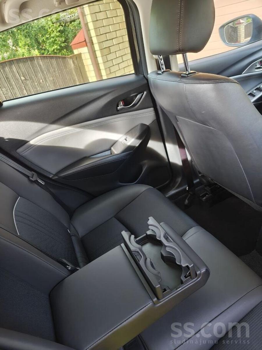 Grey Mazda CX-3 2019 in Riga, with an engine capacity of 2.00 L and mileage of 90 thousand km for 17500 €, photo 7 on AUTOMOTO.COM.LV