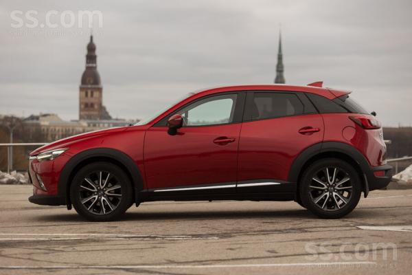 Red Mazda CX-3 2016 in Riga, with an engine capacity of 1.50 L and mileage of 0 thousand km for 11550 €, photo 2 on AUTOMOTO.COM.LV