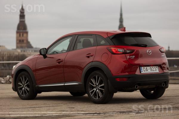 Red Mazda CX-3 2016 in Riga, with an engine capacity of 1.50 L and mileage of 0 thousand km for 11550 €, photo 3 on AUTOMOTO.COM.LV