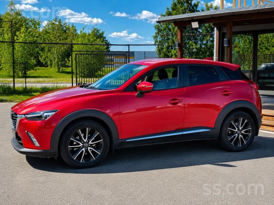 Red Mazda CX-3 2016 in Riga, with an engine capacity of 1.50 L and mileage of 176 thousand km for 10450 €, photo 3 on AUTOMOTO.COM.LV