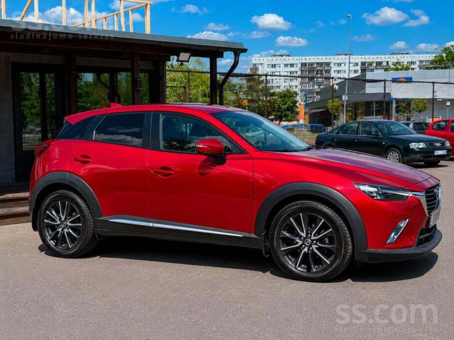 Red Mazda CX-3 2016 in Riga, with an engine capacity of 1.50 L and mileage of 176 thousand km for 10450 €, photo 5 on AUTOMOTO.COM.LV