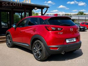 Red Mazda CX-3 2016 in Riga, with an engine capacity of 1.50 L and mileage of 176 thousand km for 10450 €, photo 6 on AUTOMOTO.COM.LV