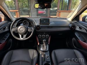 Red Mazda CX-3 2016 in Riga, with an engine capacity of 1.50 L and mileage of 176 thousand km for 10450 €, photo 11 on AUTOMOTO.COM.LV