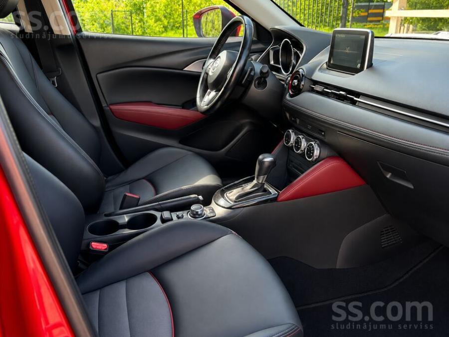 Red Mazda CX-3 2016 in Riga, with an engine capacity of 1.50 L and mileage of 176 thousand km for 10450 €, photo 13 on AUTOMOTO.COM.LV