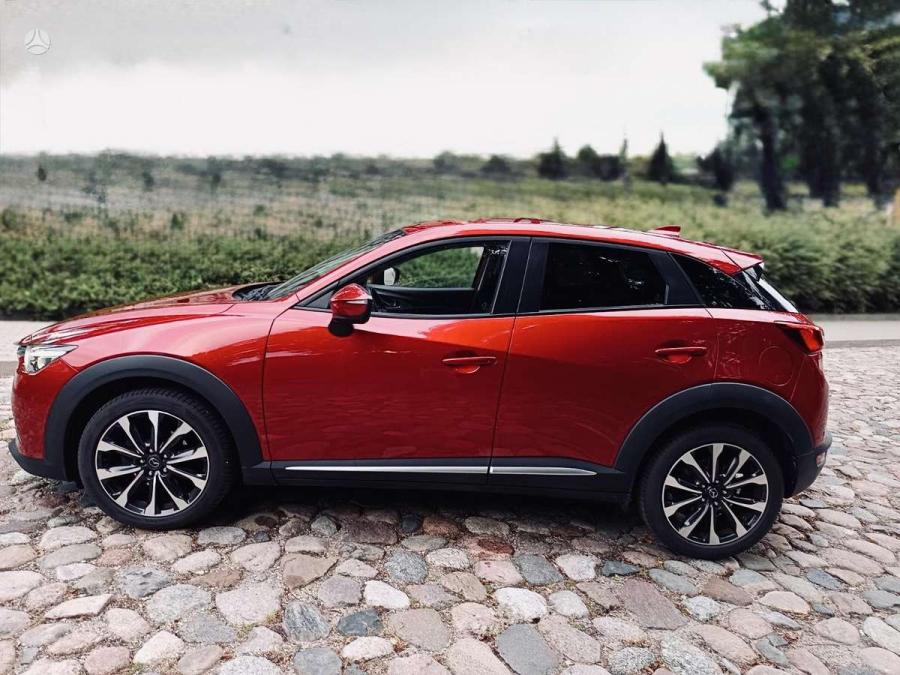 Red Mazda CX-3 2017 in Utena, with an engine capacity of 1.50 L and mileage of 126 thousand km for 13650 €, photo 9 on AUTOMOTO.COM.LV