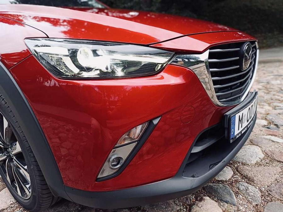 Red Mazda CX-3 2017 in Utena, with an engine capacity of 1.50 L and mileage of 126 thousand km for 13650 €, photo 11 on AUTOMOTO.COM.LV