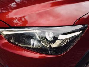 Red Mazda CX-3 2017 in Utena, with an engine capacity of 1.50 L and mileage of 126 thousand km for 13650 €, photo 12 on AUTOMOTO.COM.LV