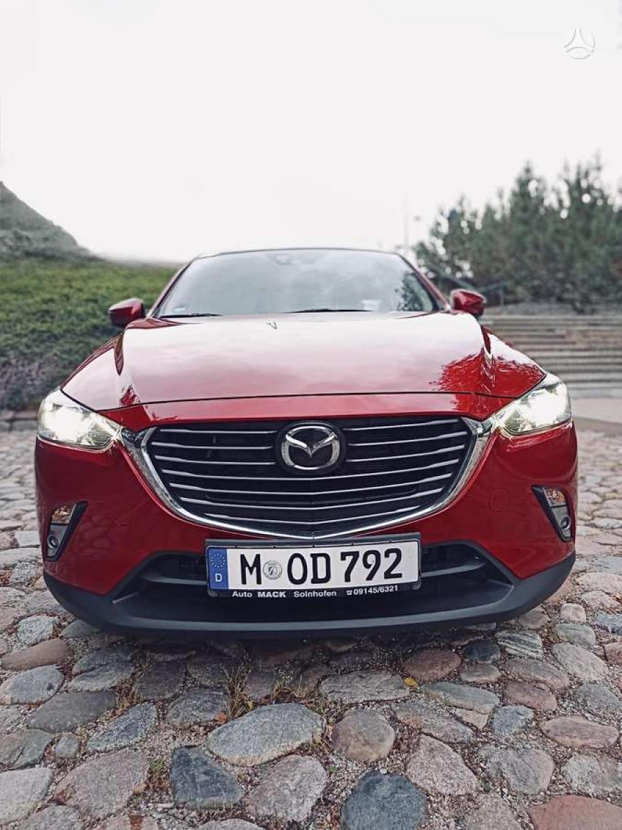 Red Mazda CX-3 2017 in Utena, with an engine capacity of 1.50 L and mileage of 126 thousand km for 13650 €, photo 18 on AUTOMOTO.COM.LV