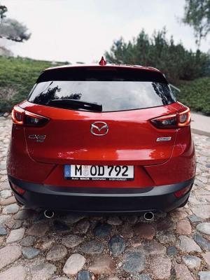 Red Mazda CX-3 2017 in Utena, with an engine capacity of 1.50 L and mileage of 126 thousand km for 13650 €, photo 19 on AUTOMOTO.COM.LV