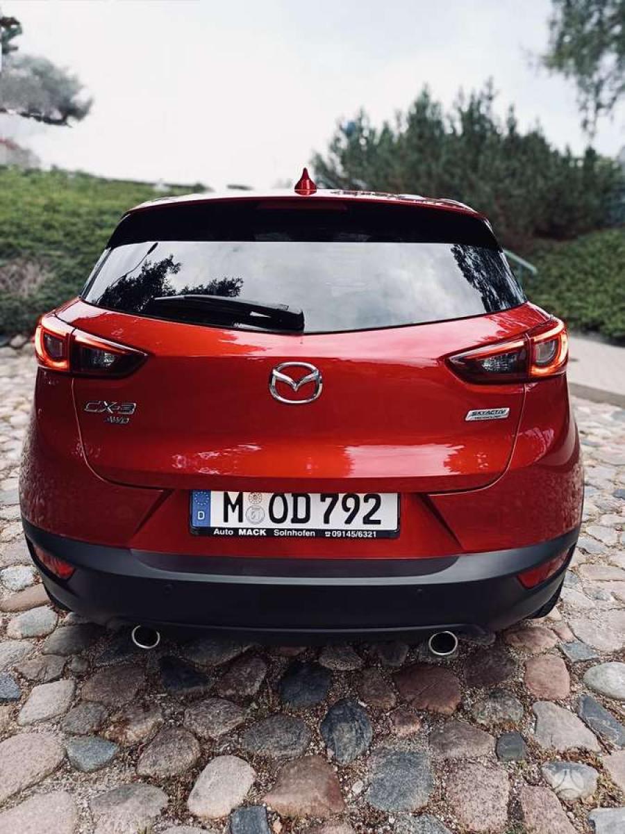 Red Mazda CX-3 2017 in Utena, with an engine capacity of 1.50 L and mileage of 126 thousand km for 13650 €, photo 19 on AUTOMOTO.COM.LV