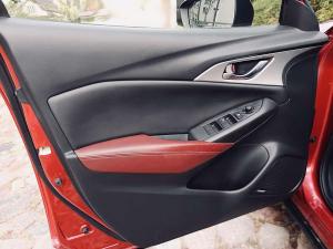 Red Mazda CX-3 2017 in Utena, with an engine capacity of 1.50 L and mileage of 126 thousand km for 13650 €, photo 28 on AUTOMOTO.COM.LV