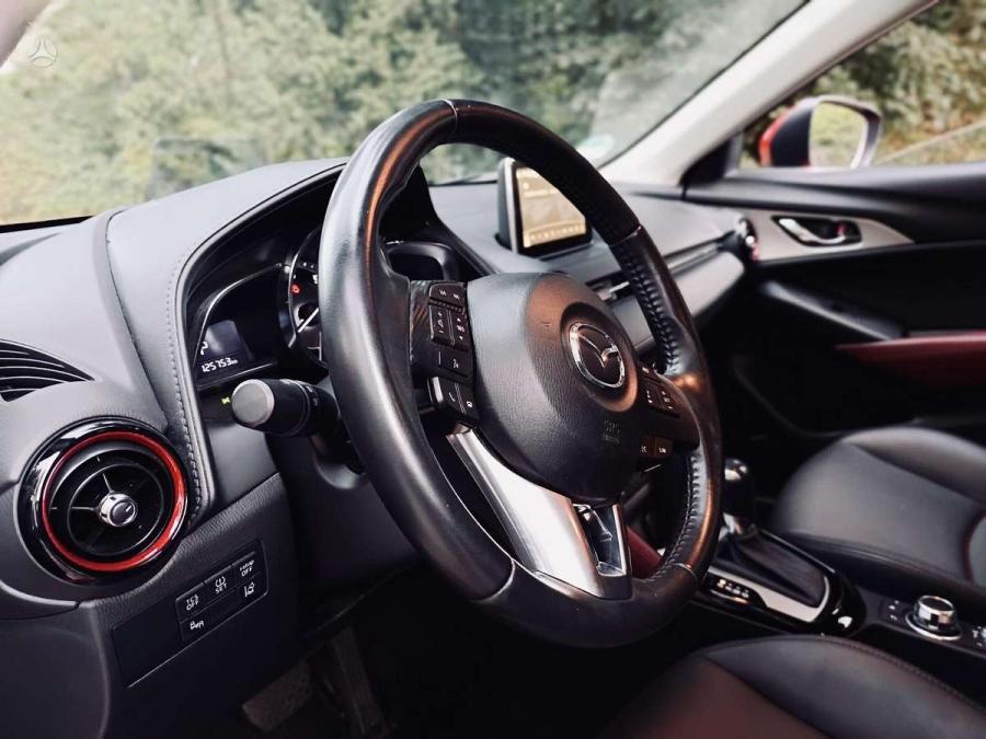 Red Mazda CX-3 2017 in Utena, with an engine capacity of 1.50 L and mileage of 126 thousand km for 13650 €, photo 42 on AUTOMOTO.COM.LV