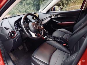 Red Mazda CX-3 2017 in Utena, with an engine capacity of 1.50 L and mileage of 126 thousand km for 13650 €, photo 44 on AUTOMOTO.COM.LV
