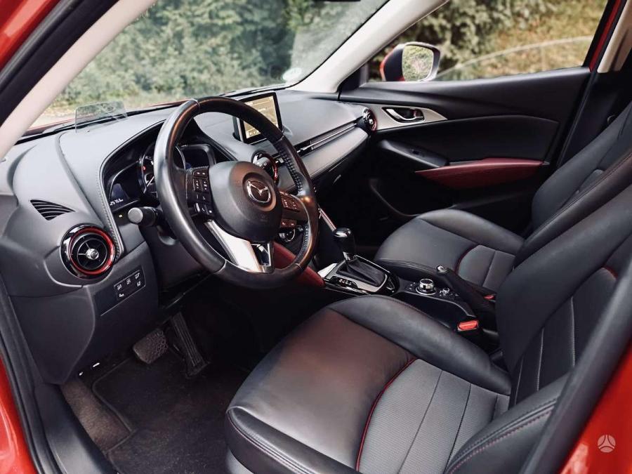 Red Mazda CX-3 2017 in Utena, with an engine capacity of 1.50 L and mileage of 126 thousand km for 13650 €, photo 44 on AUTOMOTO.COM.LV