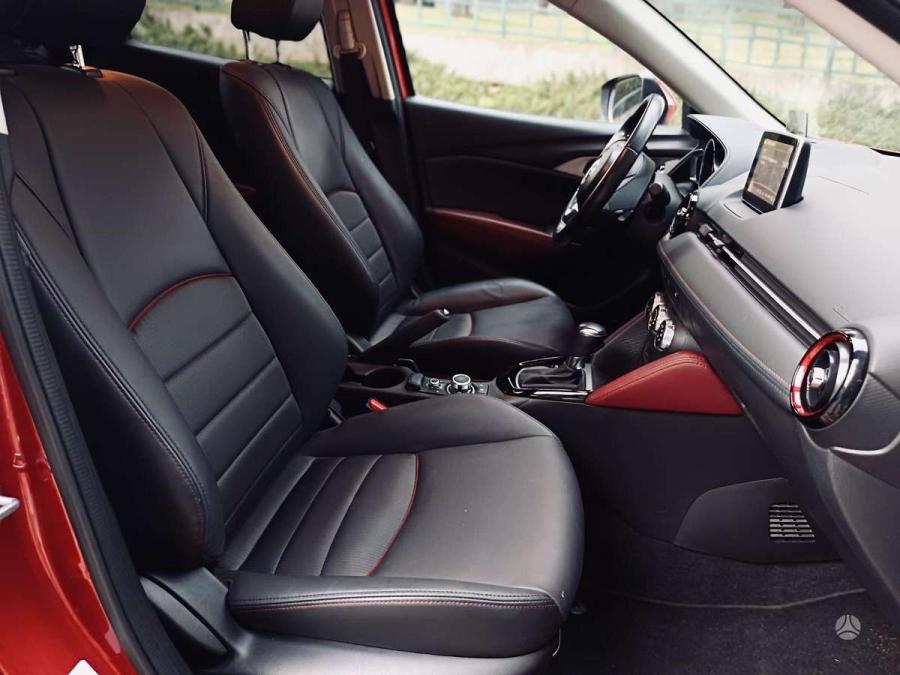Red Mazda CX-3 2017 in Utena, with an engine capacity of 1.50 L and mileage of 126 thousand km for 13650 €, photo 45 on AUTOMOTO.COM.LV