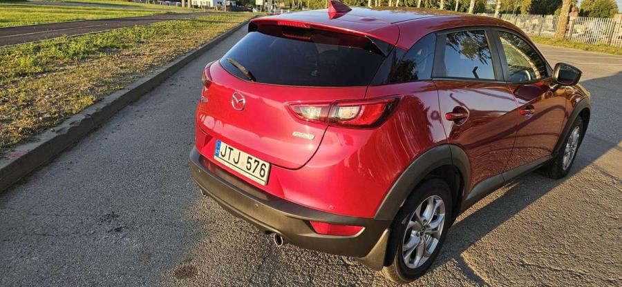 Sarkans Mazda CX-3 2017 Marijampole, ar dzinēja tilpumu 2.00 L un nobraukumu 103 tūkst. km par 13500 €, foto 3 vietnē AUTOMOTO.COM.LV