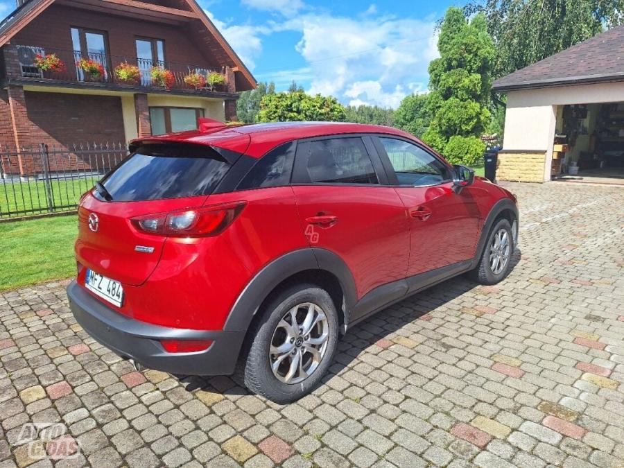 Red Mazda CX-3 2017 in Plunge, with an engine capacity of 2.00 L and mileage of 75 thousand km for 15600 €, photo 3 on AUTOMOTO.COM.LV