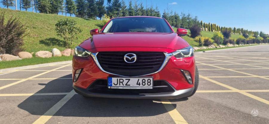 Red Mazda CX-3 2017 in Vilnius, with an engine capacity of 2.00 L and mileage of 123 thousand km for 12900 €, photo 6 on AUTOMOTO.COM.LV
