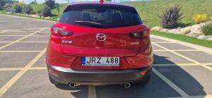 Red Mazda CX-3 2017 in Vilnius, with an engine capacity of 2.00 L and mileage of 123 thousand km for 12900 €, photo 7 on AUTOMOTO.COM.LV