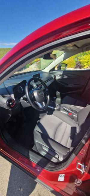 Red Mazda CX-3 2017 in Vilnius, with an engine capacity of 2.00 L and mileage of 123 thousand km for 12900 €, photo 12 on AUTOMOTO.COM.LV