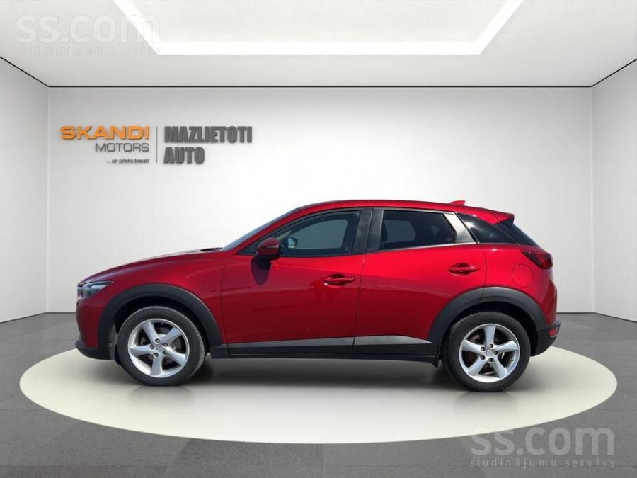 Red Mazda CX-3 2018 in Riga, with an engine capacity of 2.00 L and mileage of 224 thousand km for 9990 €, photo 4 on AUTOMOTO.COM.LV