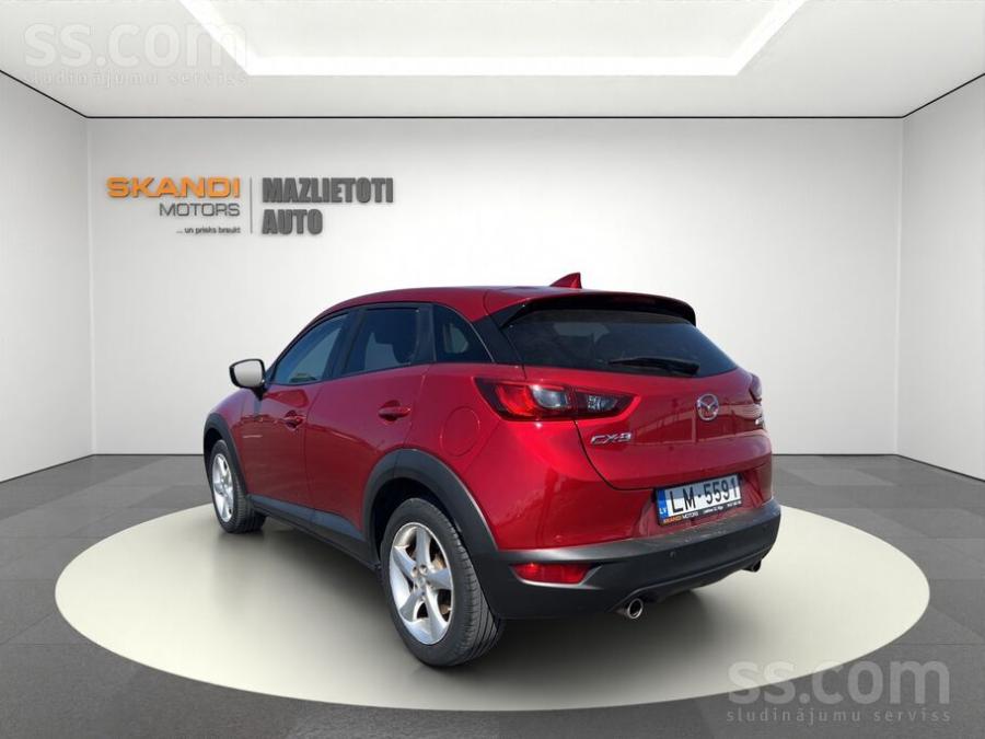 Red Mazda CX-3 2018 in Riga, with an engine capacity of 2.00 L and mileage of 224 thousand km for 9990 €, photo 5 on AUTOMOTO.COM.LV