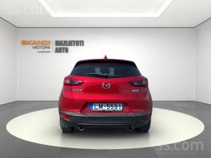 Red Mazda CX-3 2018 in Riga, with an engine capacity of 2.00 L and mileage of 224 thousand km for 9990 €, photo 6 on AUTOMOTO.COM.LV