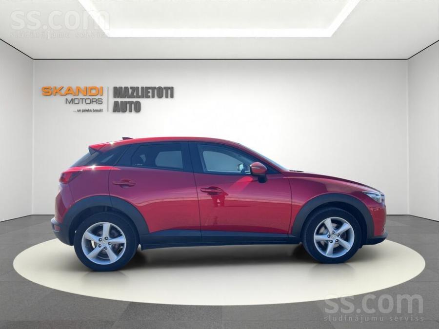 Red Mazda CX-3 2018 in Riga, with an engine capacity of 2.00 L and mileage of 224 thousand km for 9990 €, photo 8 on AUTOMOTO.COM.LV