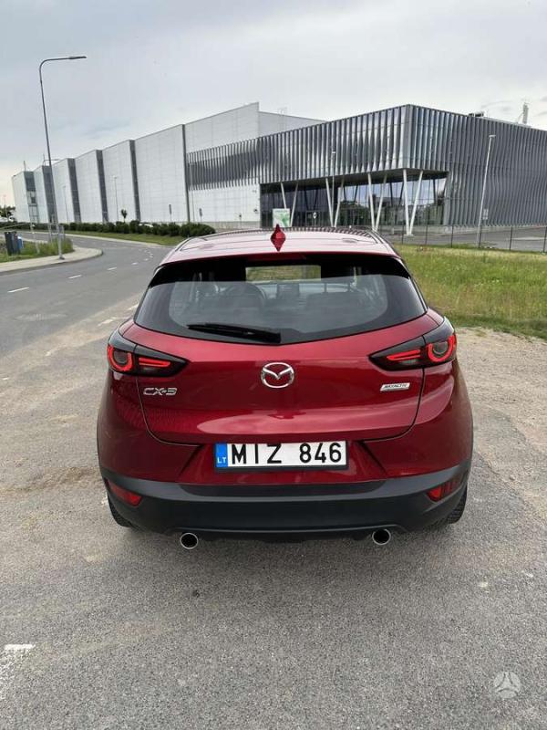 Red Mazda CX-3 2019 in Vilnius, with an engine capacity of 2.00 L and mileage of 102 thousand km for 15200 €, photo 4 on AUTOMOTO.COM.LV