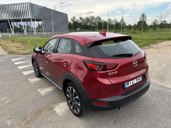 Red Mazda CX-3 2019 in Vilnius, with an engine capacity of 2.00 L and mileage of 102 thousand km for 15200 €, photo 5 on AUTOMOTO.COM.LV
