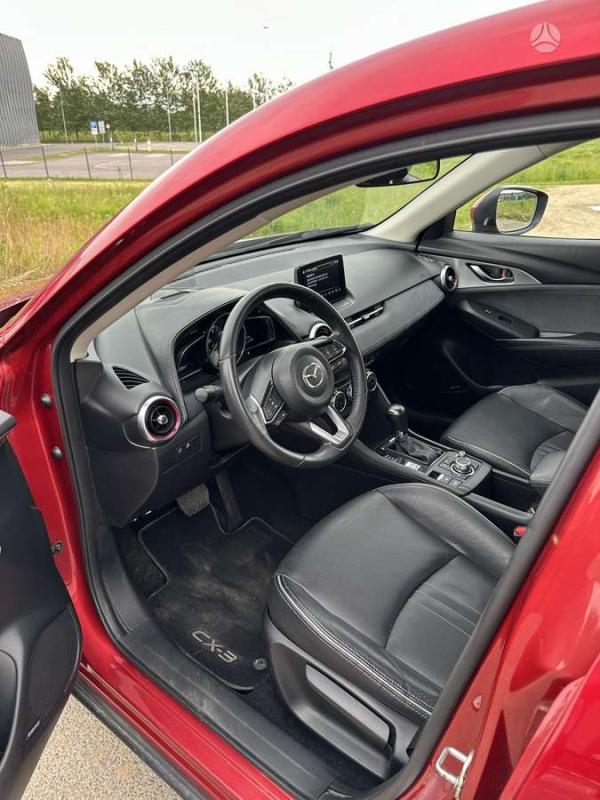 Red Mazda CX-3 2019 in Vilnius, with an engine capacity of 2.00 L and mileage of 102 thousand km for 15200 €, photo 7 on AUTOMOTO.COM.LV