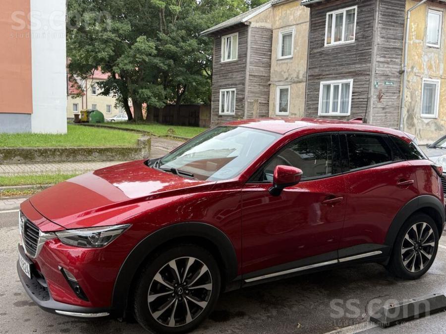 Red Mazda CX-3 2019 in Liepaja, with an engine capacity of 2.00 L and mileage of 107 thousand km for 13800 €, photo 1 on AUTOMOTO.COM.LV