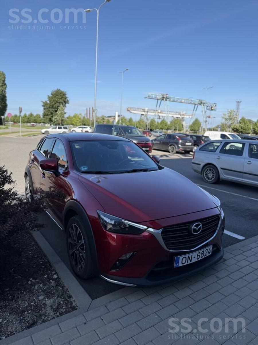 Red Mazda CX-3 2019 in Liepaja, with an engine capacity of 2.00 L and mileage of 107 thousand km for 13800 €, photo 5 on AUTOMOTO.COM.LV